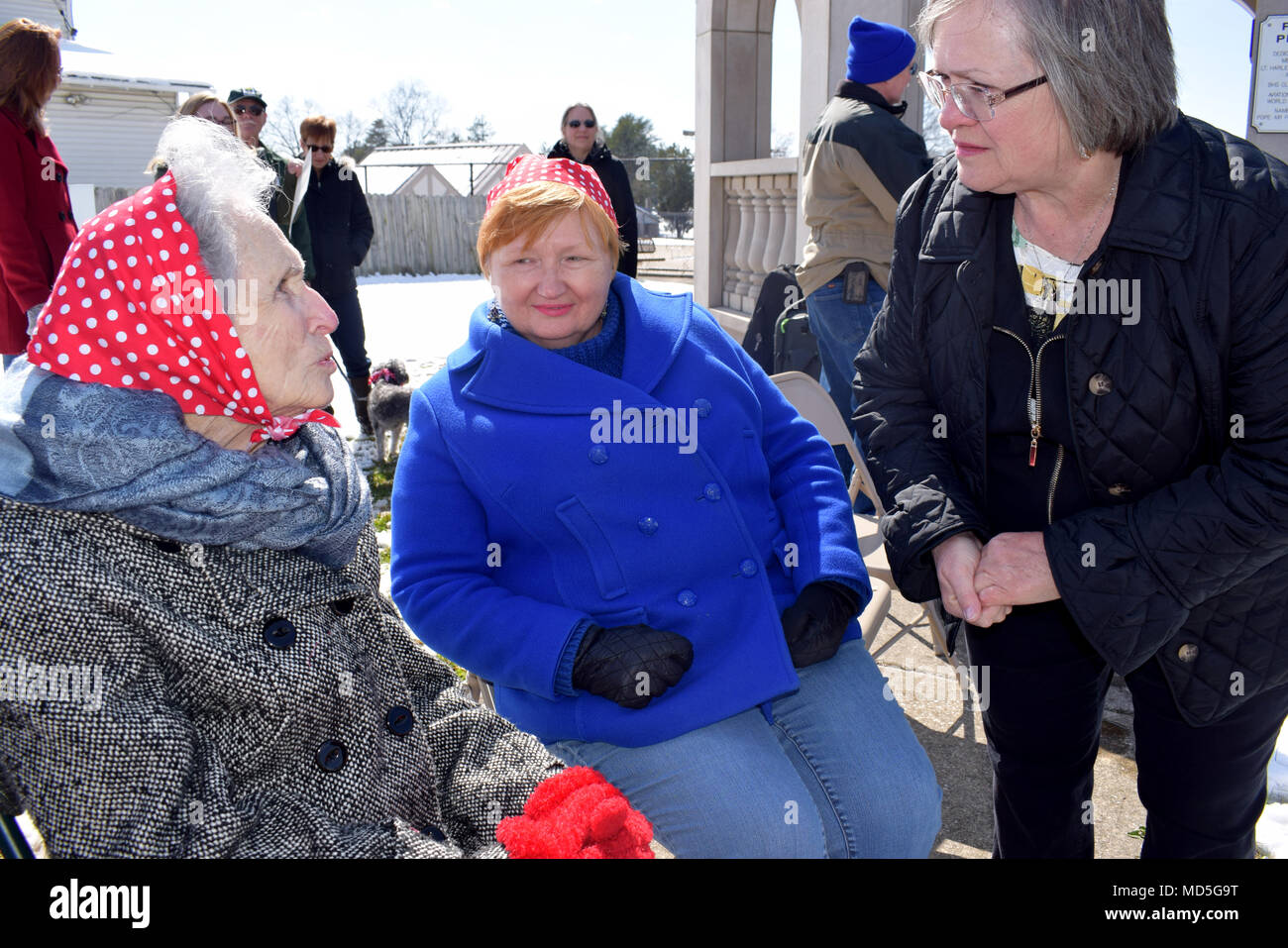 Crane Army Ammunition Activity employee Brenda Corey (right) meets ...