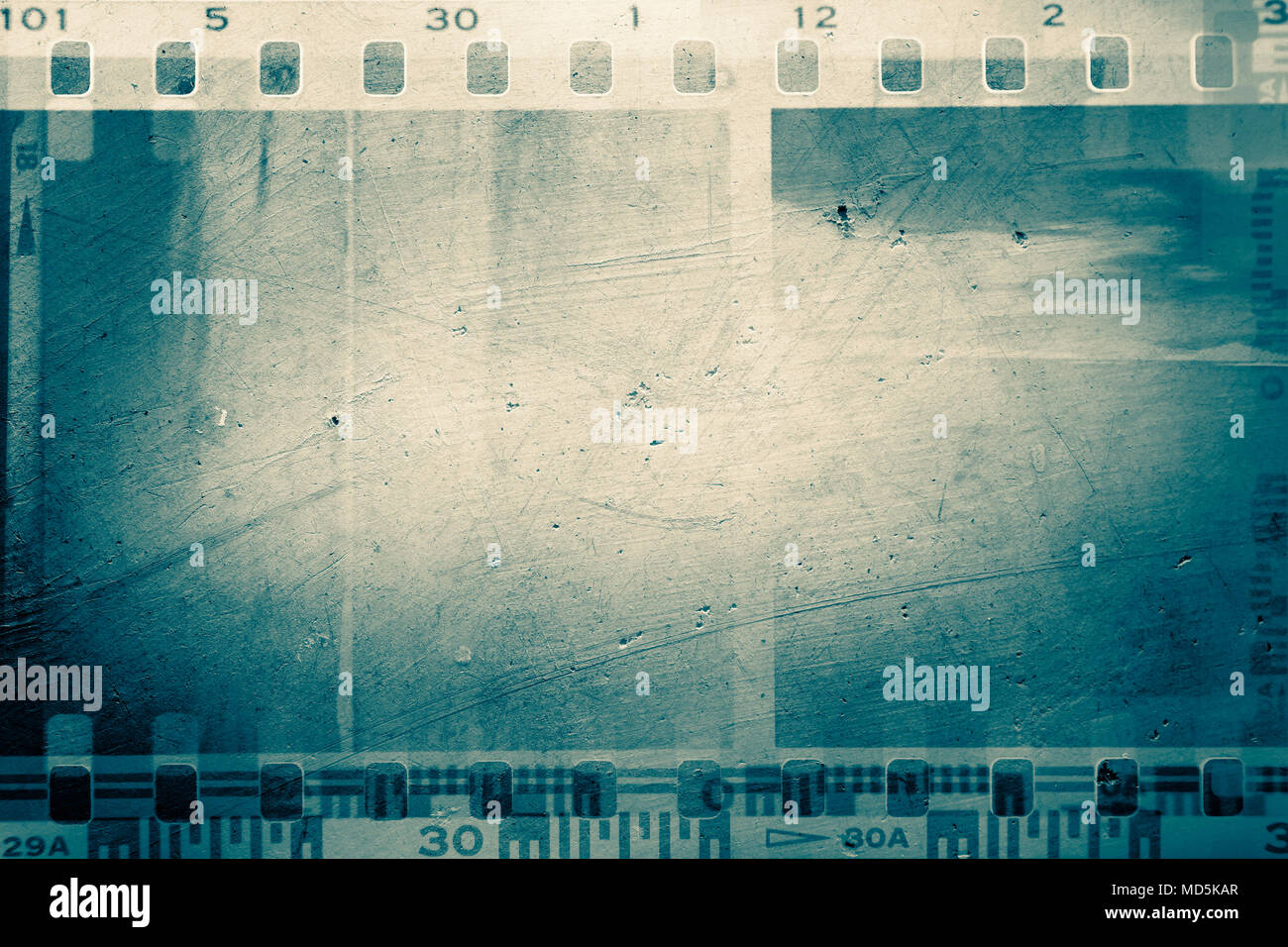 Film negative frames on rough background Stock Photo - Alamy