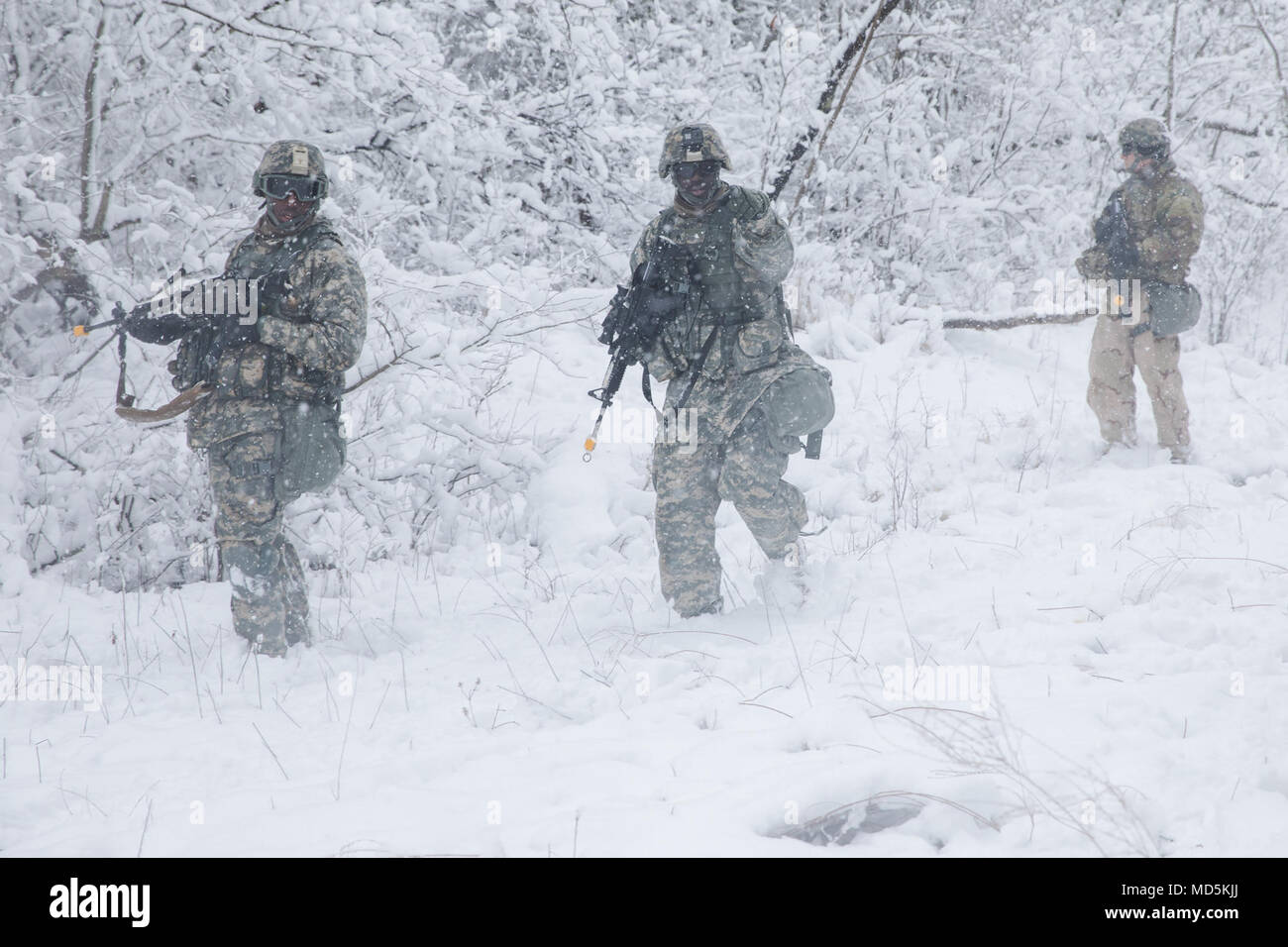 U.S. Army Reserve Pfc. Desmond Pettaway, left, Sgt. Prosper Ndow, and ...