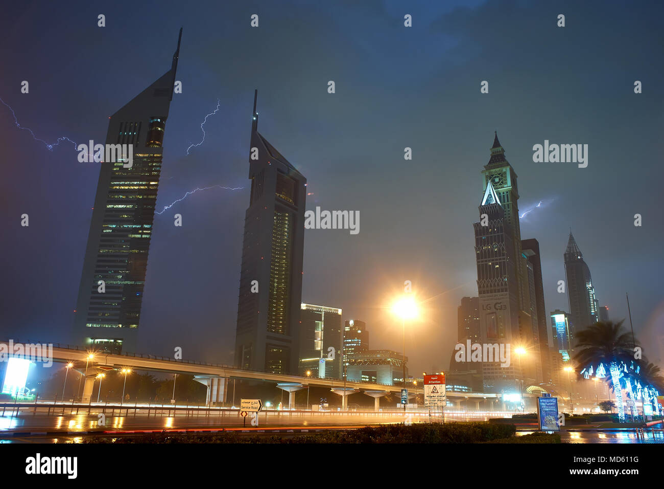 emirates tower at night it rains and beats lightning Stock Photo - Alamy