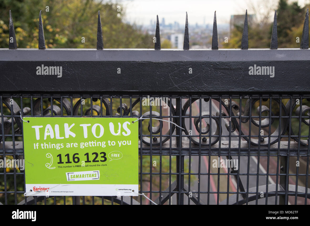 A sign for the Samaritans charity at a bridge over Archway Road in ...