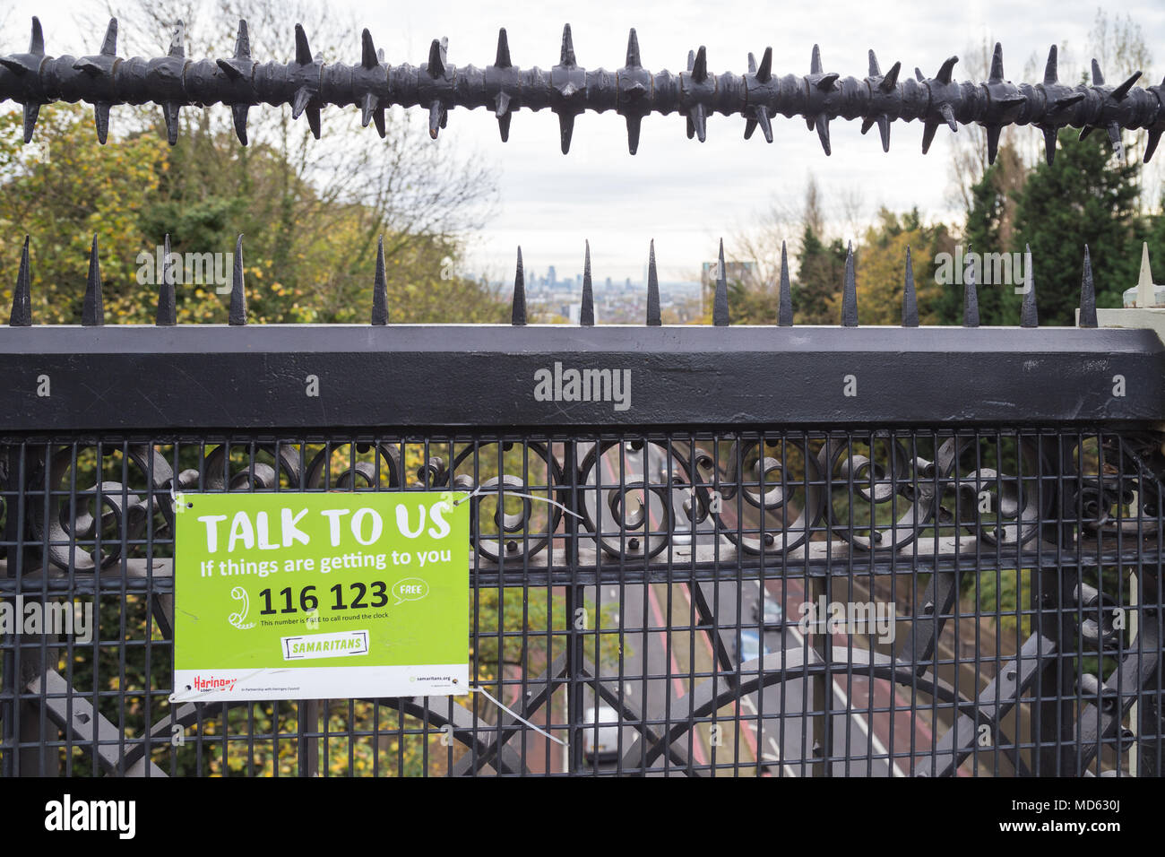 A sign for the Samaritans charity at a bridge over Archway Road in ...
