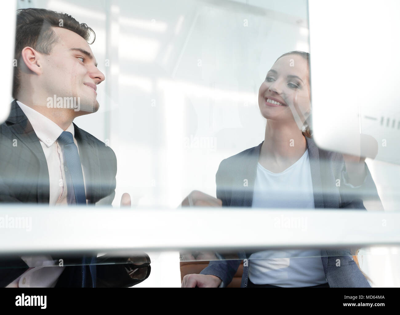 business concept.colleagues looking at computer screen Stock Photo - Alamy