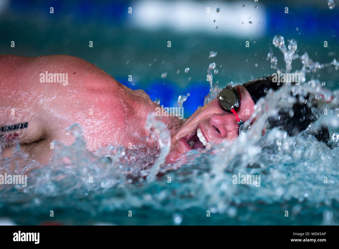 U.S. Marine Corps Staff Sgt. Justin Muhlhauser competes in the 4x50 ...
