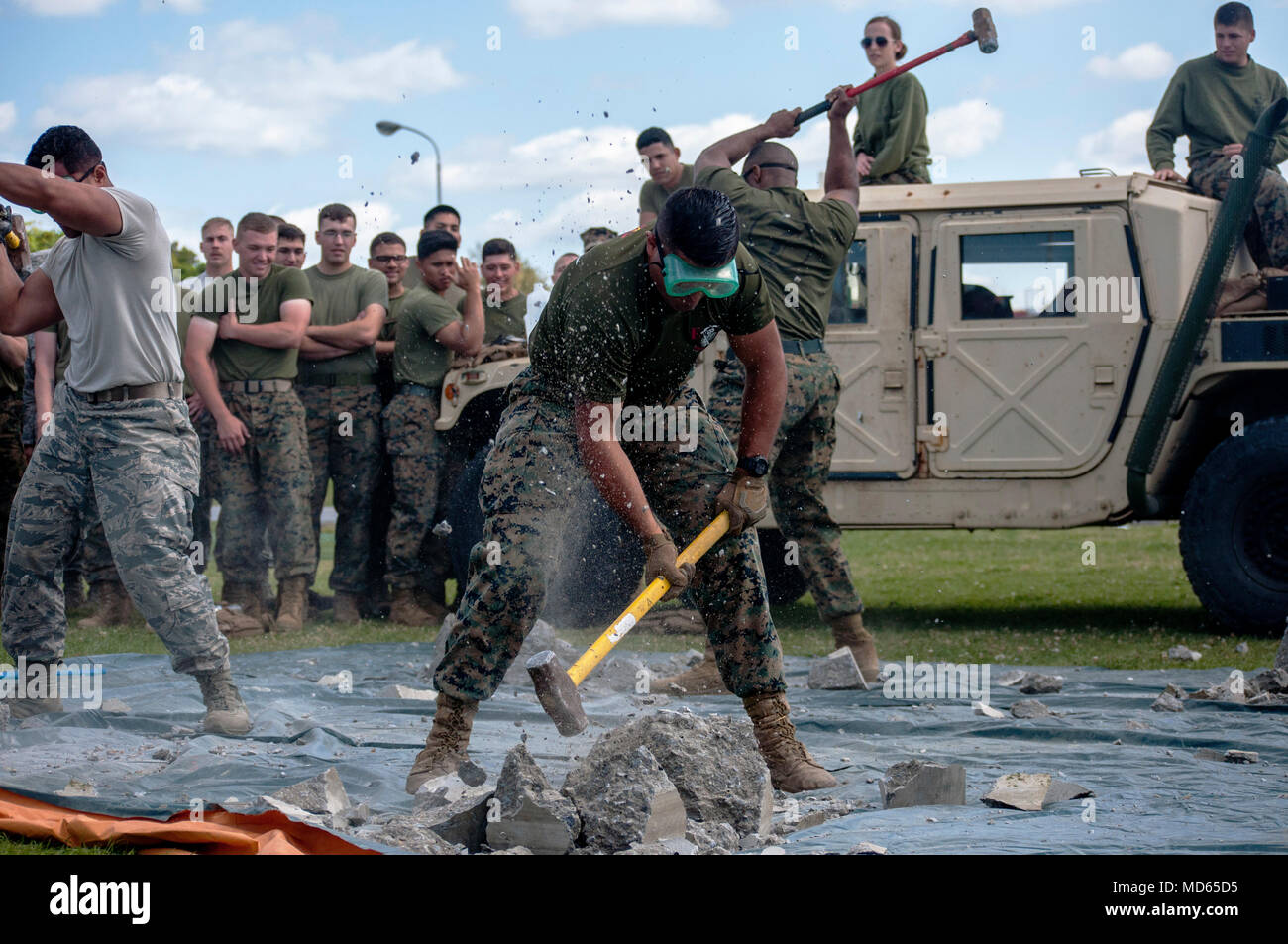 U.S. Marines and Airmen race to find rebar hidden in the cement block ...