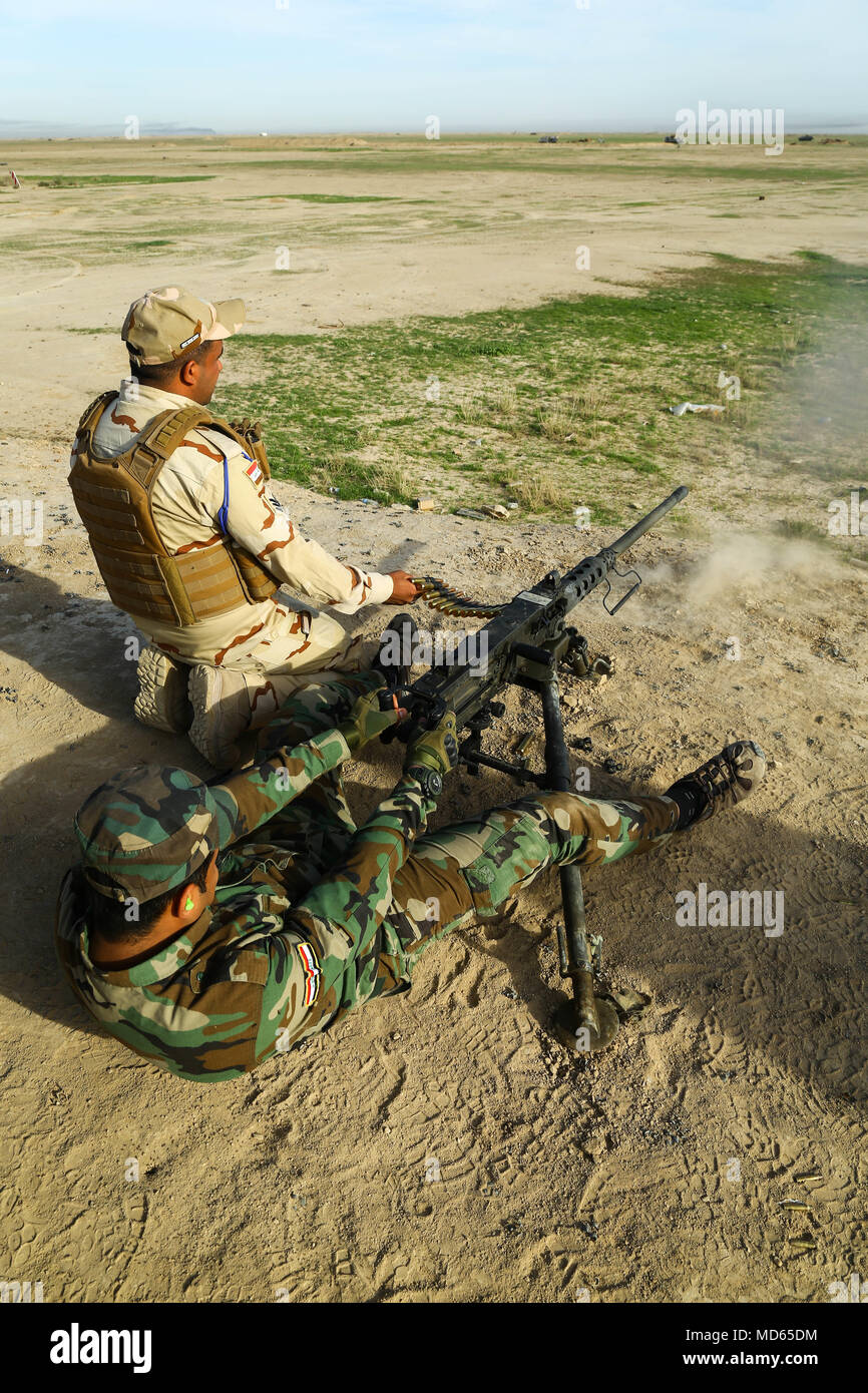Iraqi soldiers fire a .50-caliber machine gun during the heavy weapons ...