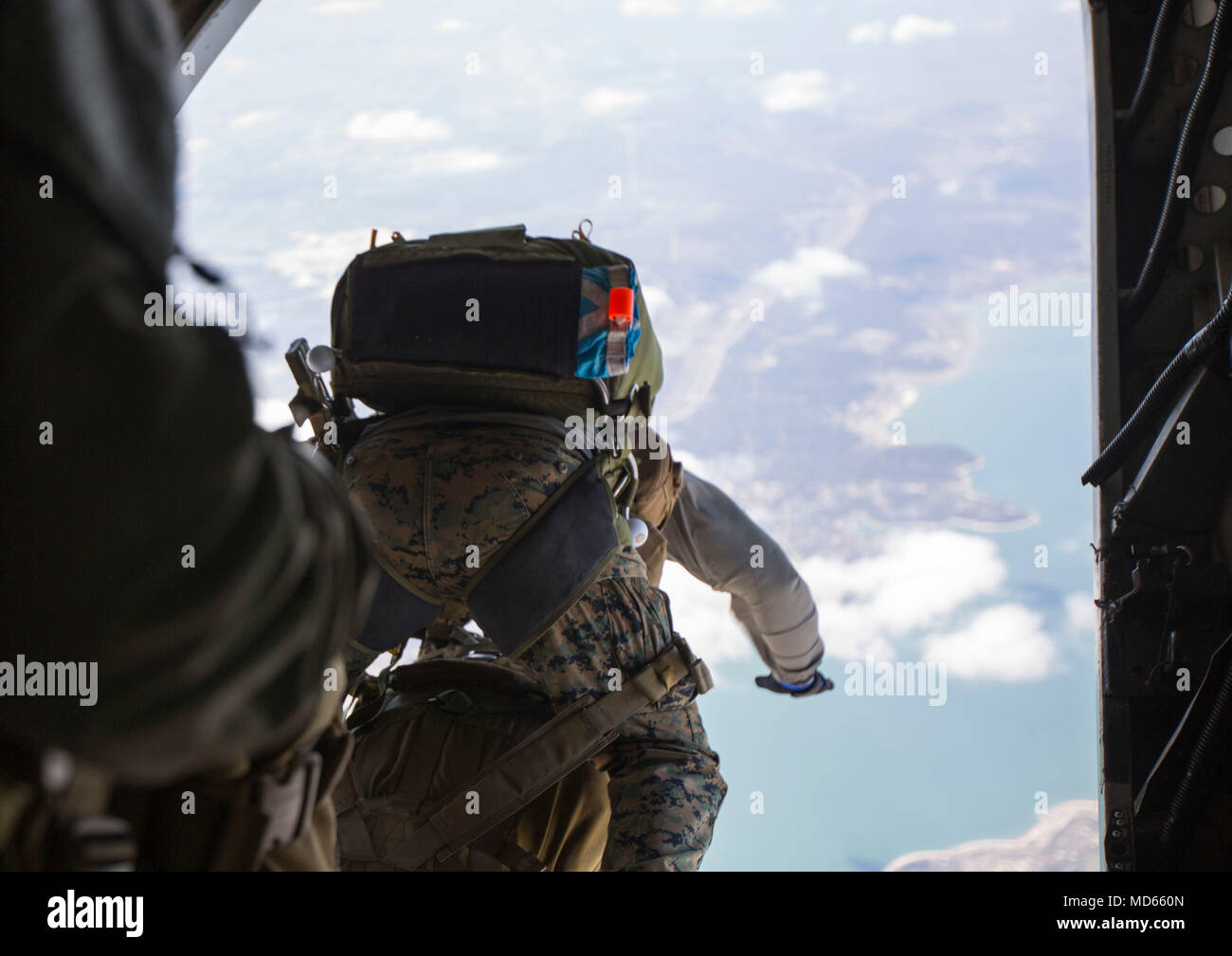 Reconnaissance Marines conduct parachute jumps out of a CASA C-212 ...