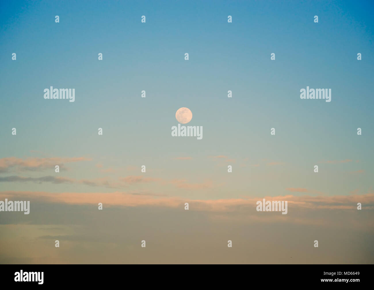 Moonrise over sunset beach hi-res stock photography and images - Alamy