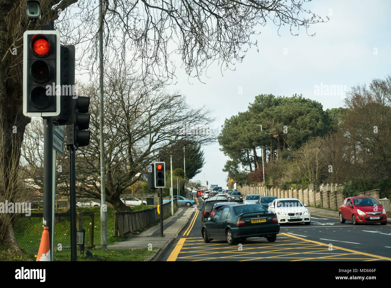 Cars, automobiles on a busy main road in Poole, Dorset, England during ...