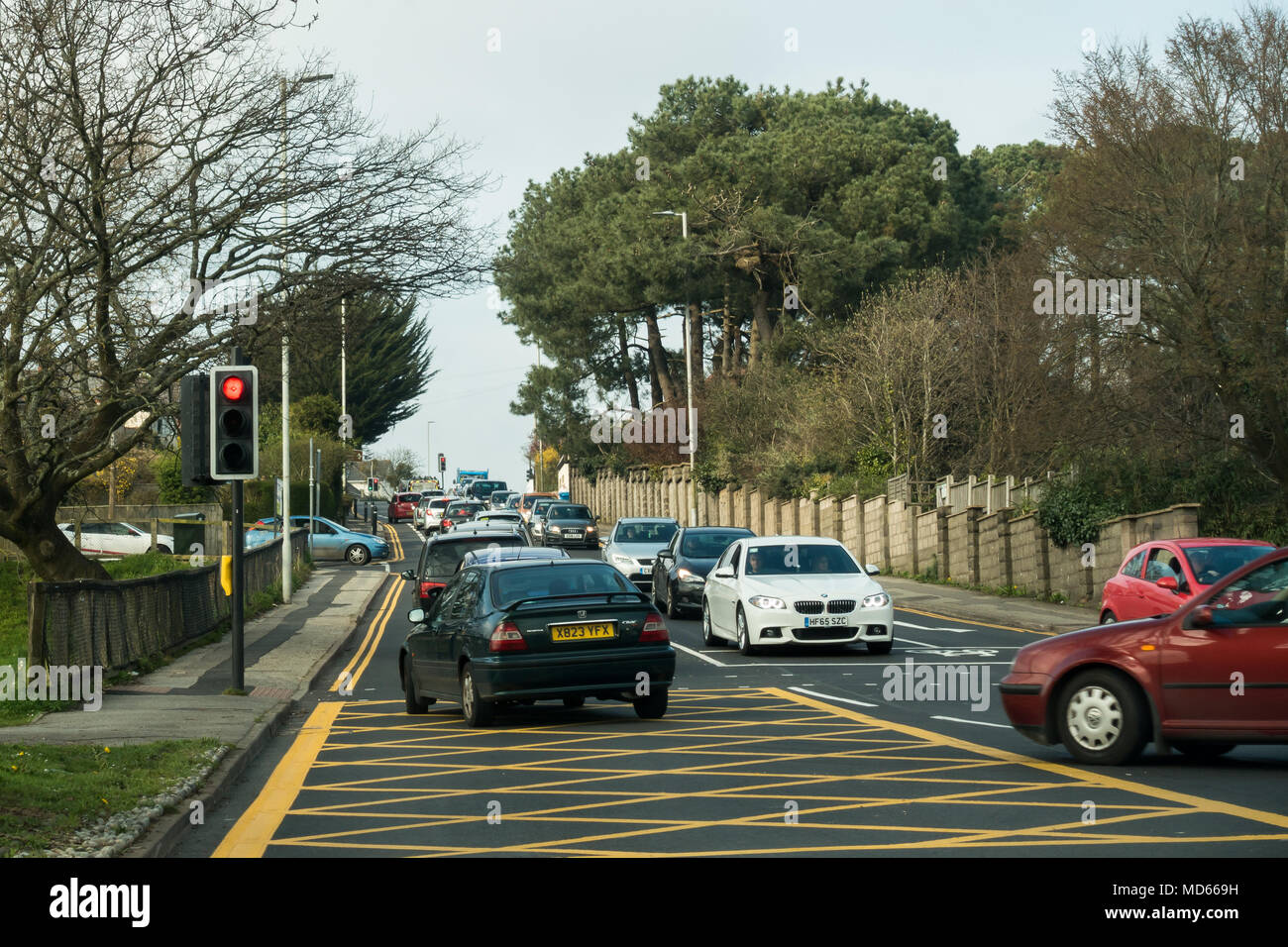 Cars, automobiles on a busy main road in Poole, Dorset, England during ...