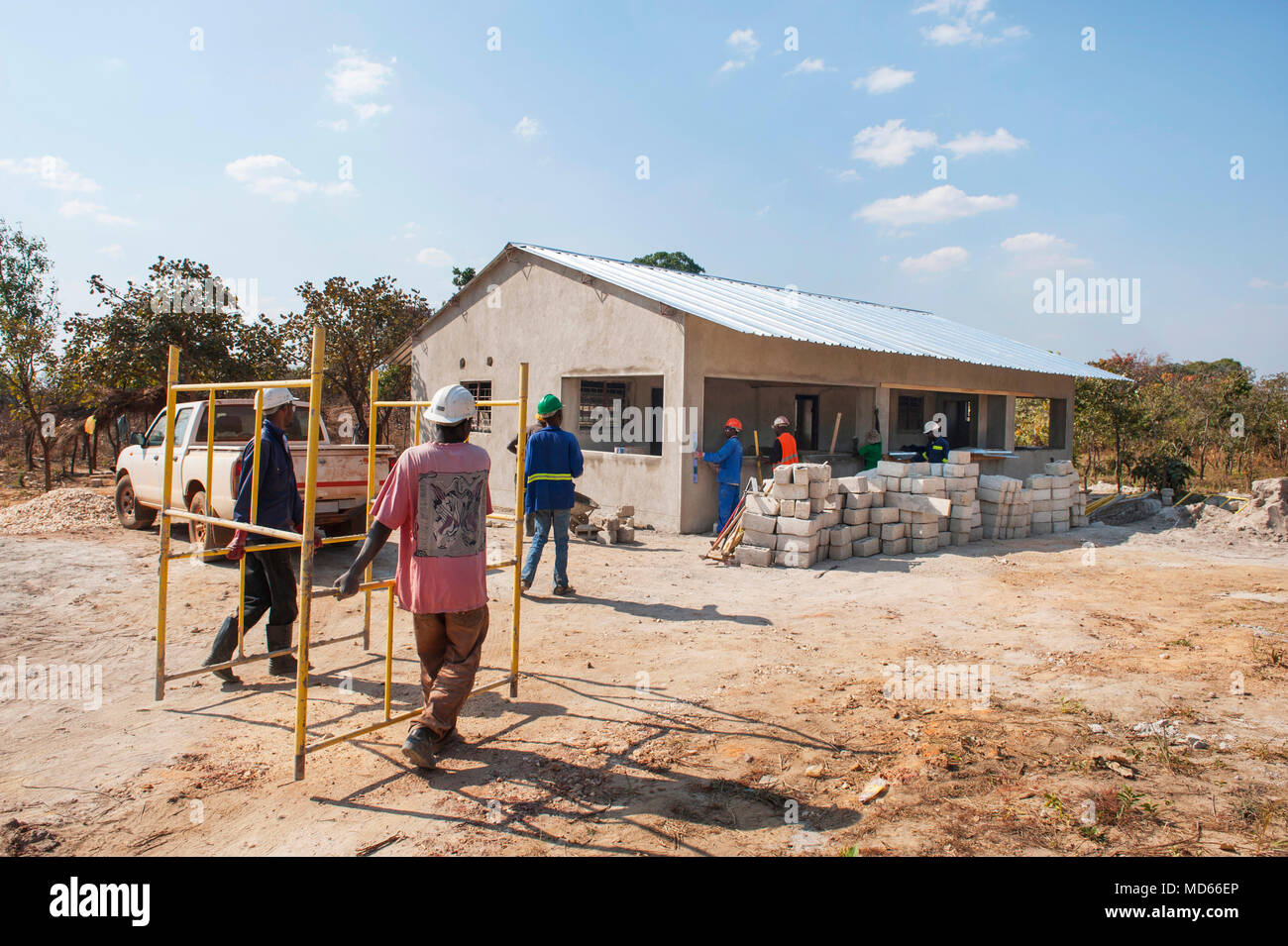 Builders on site building house in Zambia, Africa Stock Photo - Alamy
