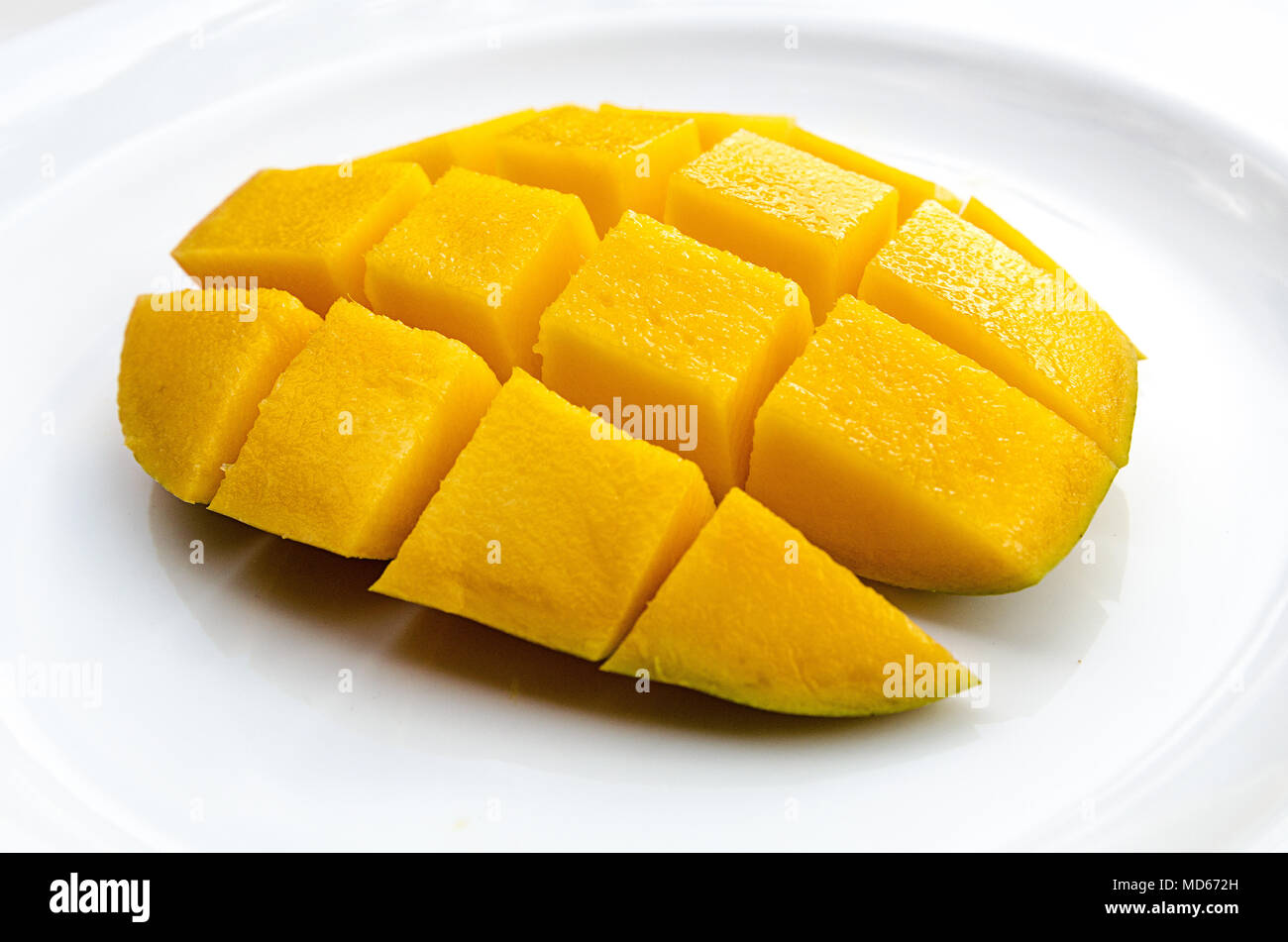 Mango cubes plate hi-res stock photography and images - Alamy