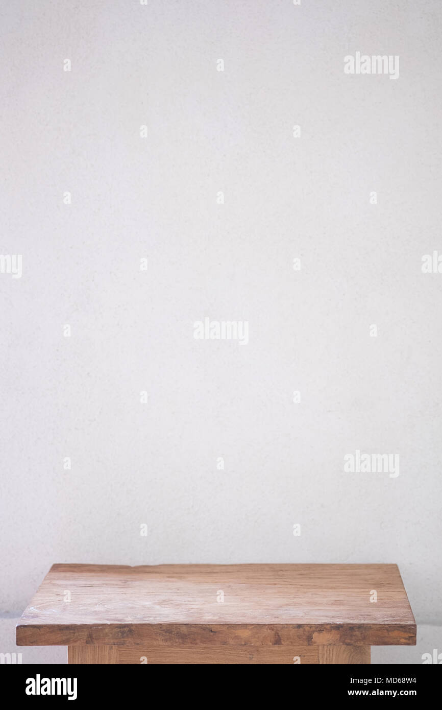 Empty table minimalism with blank wall a mockup table Stock Photo - Alamy