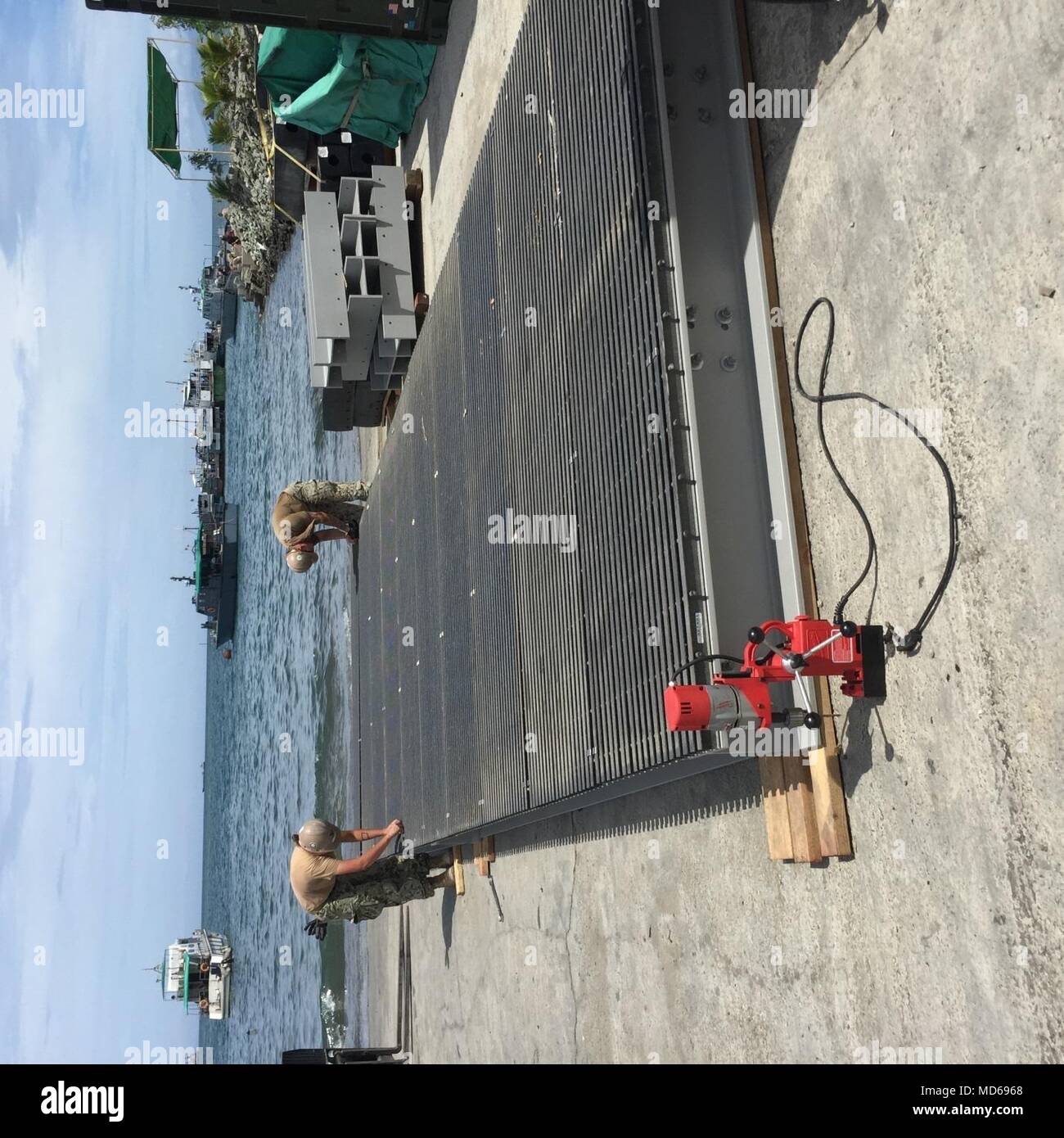 U.S. Navy Seabees assigned to Naval Mobile Construction Battalion 4 ...