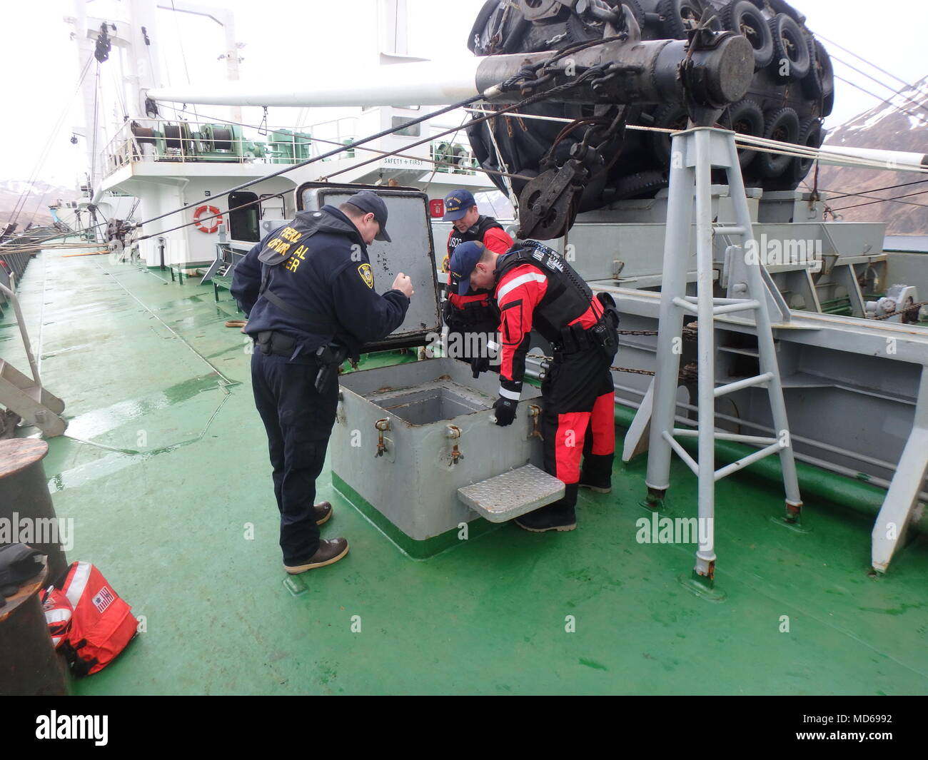 Coast Guard Petty Officer 2nd Class BM2 Alex Donoso and Petty Officer ...