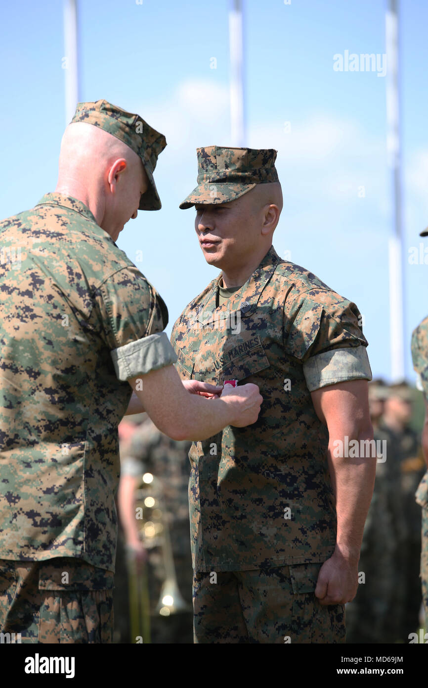 CAMP FOSTER, OKINAWA, Japan – Sgt. Maj. Peter Siaw stands at attention ...