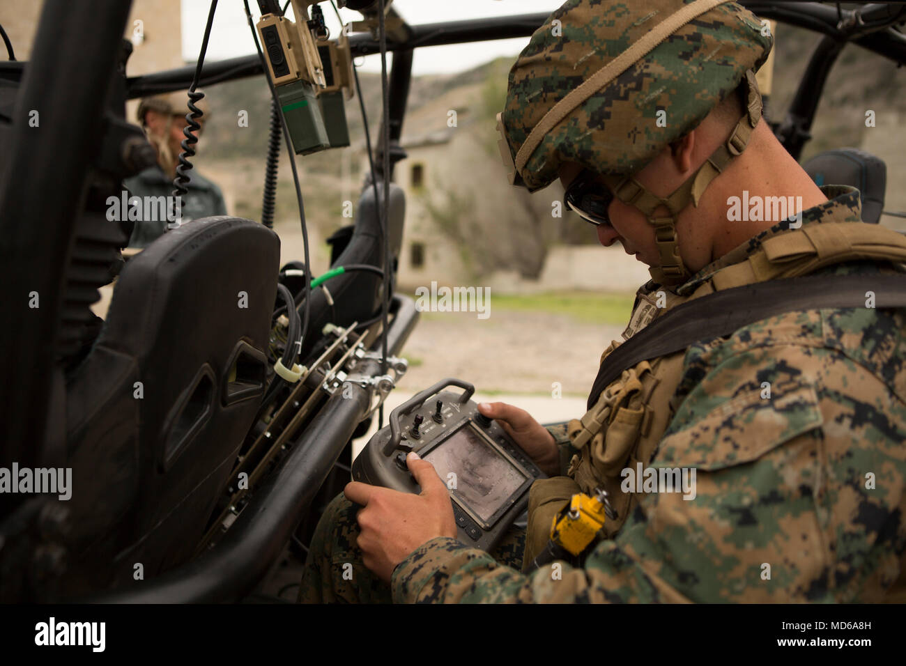 A U.S. Marine with 3rd Battalion, 4th Marines, Kilo Company tests the ...