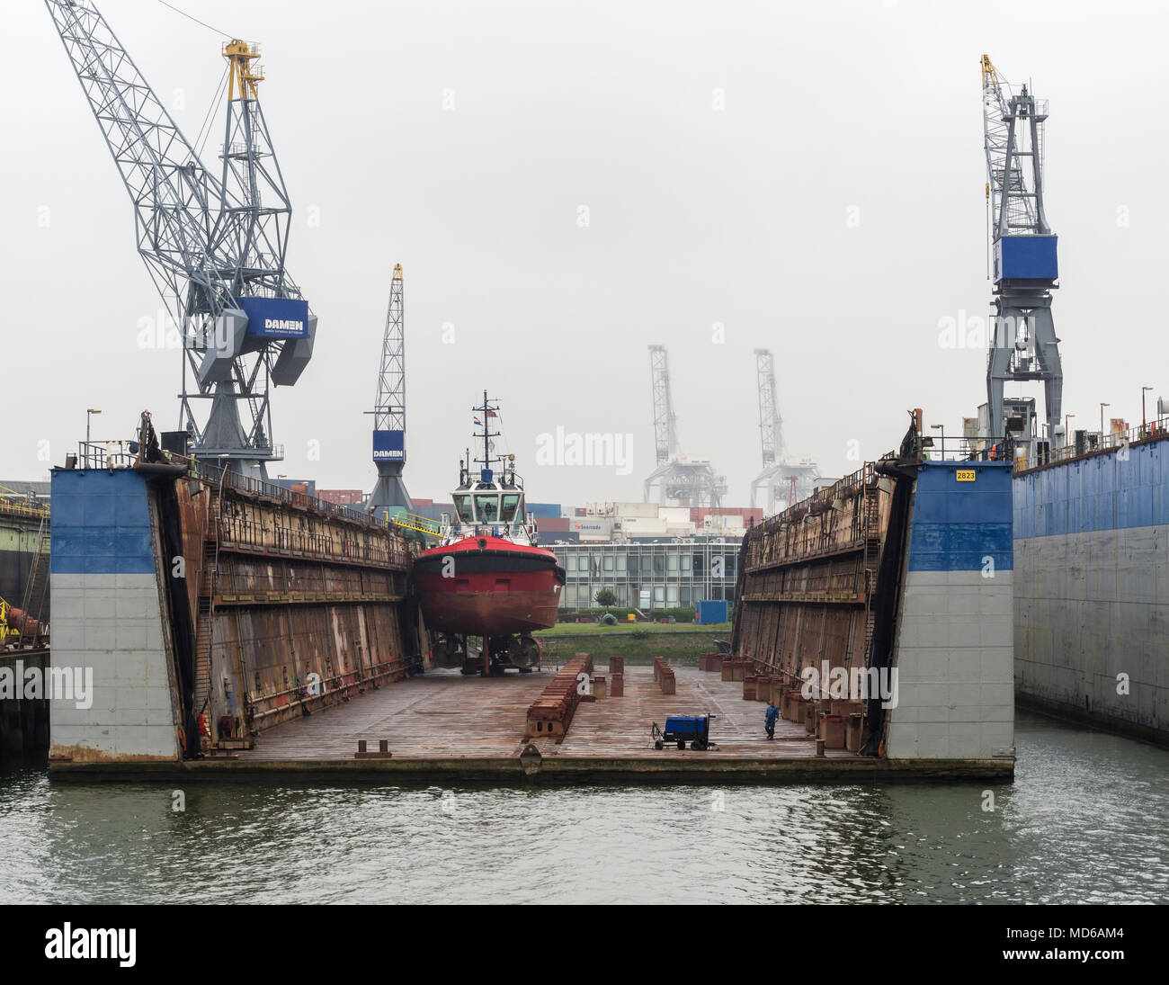 Rotterdam, Netherlands - 20 July 2015: a vessel inside the lifted dry ...