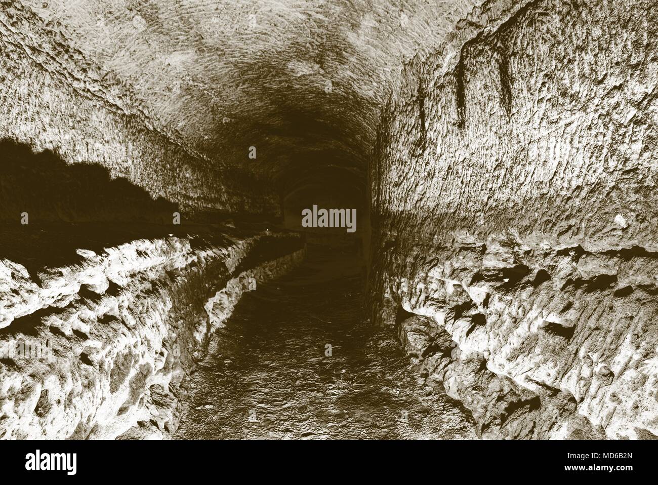 The old sandstone water tunnel, mined caves. The cave. Sandstone tunnel ...