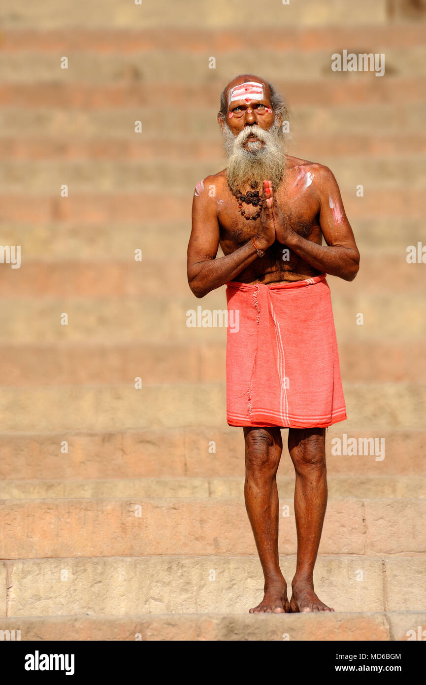 Yogi master with cataracts performs salutation as he gazes into the Sun Stock Photo - Alamy