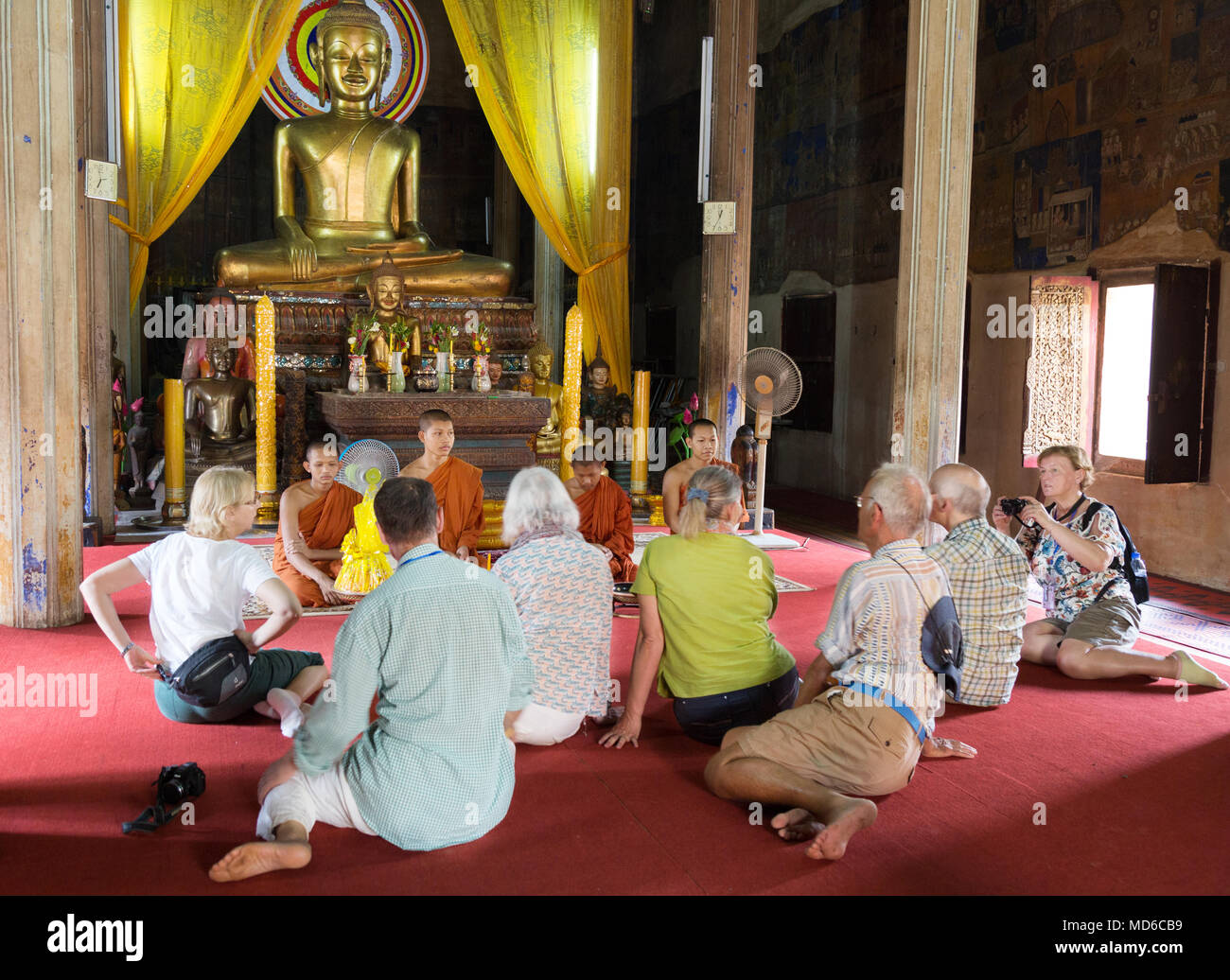 Buddhist monks in a temple hi-res stock photography and images - Alamy