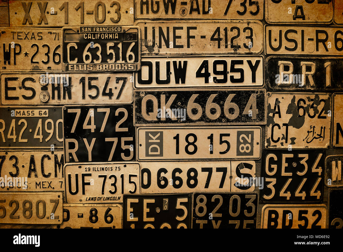 Various retro License Plates on the wall Stock Photo - Alamy