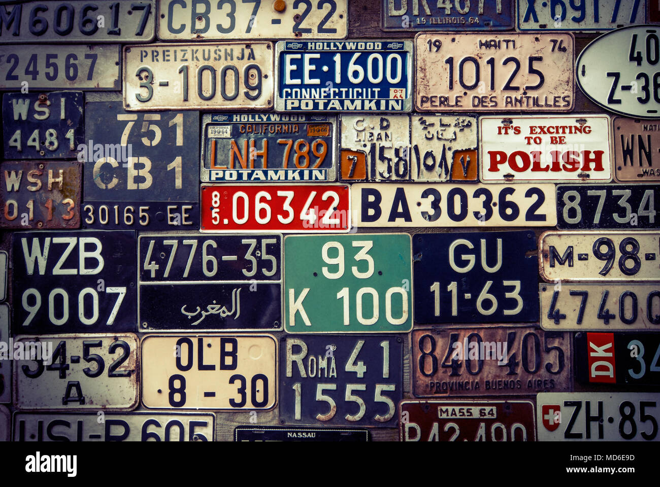 Various retro License Plates on the wall Stock Photo - Alamy