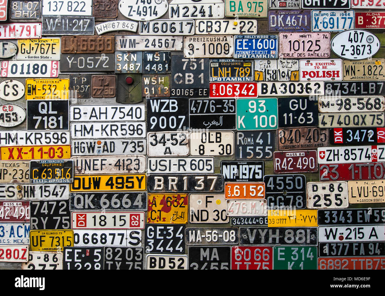Various retro License Plates on the wall Stock Photo - Alamy
