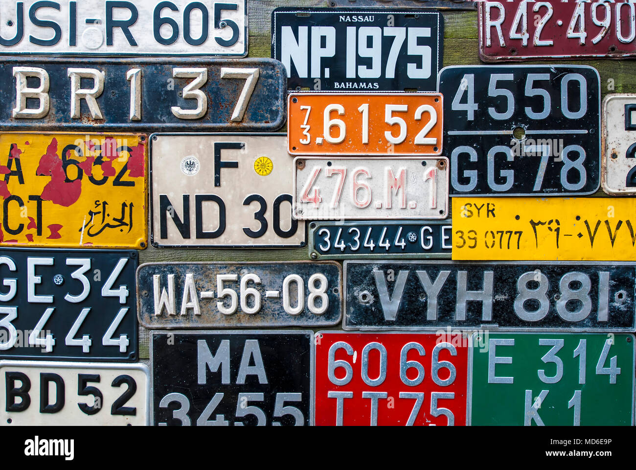 Various retro License Plates on the wall Stock Photo - Alamy