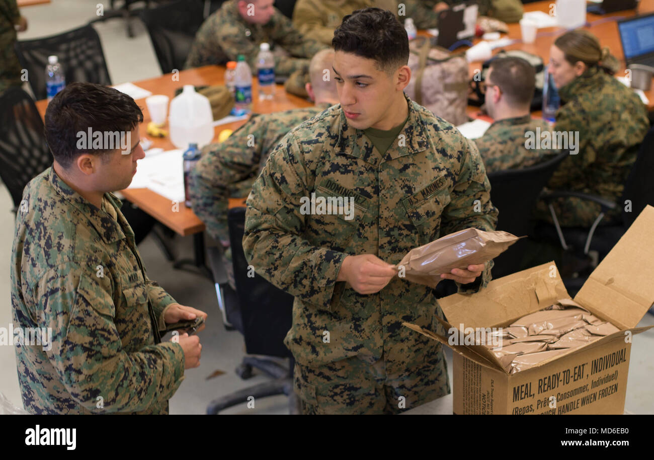 U.S. Marines receive Meals-Ready-To-Eat for lunch during Combined Unit ...