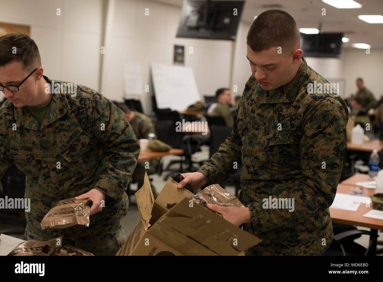 U.S. Marines receive Meals-Ready-To-Eat for lunch during the Combined ...