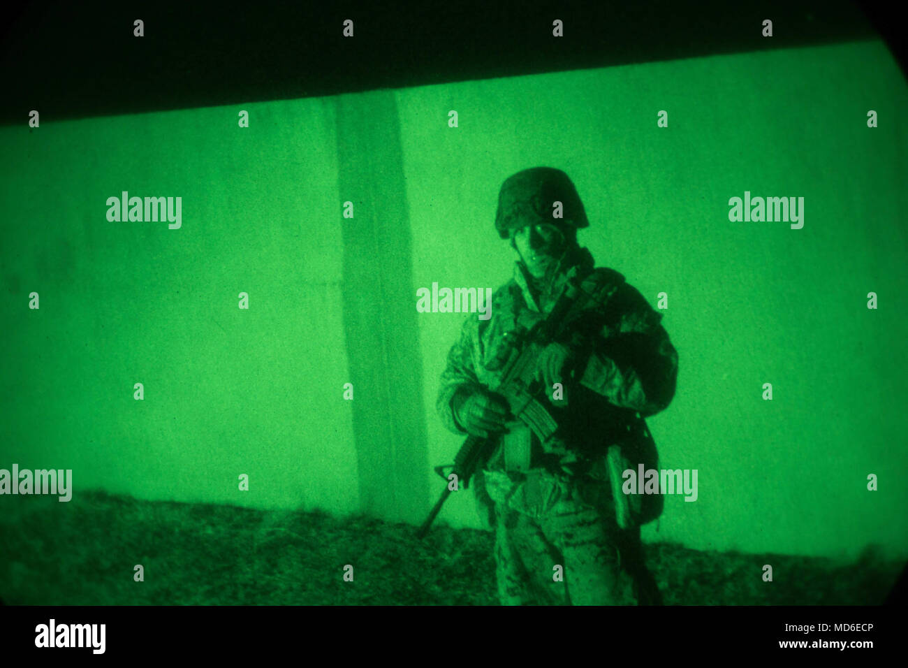 A U.S. Marine participate practices tactical night operations during ...