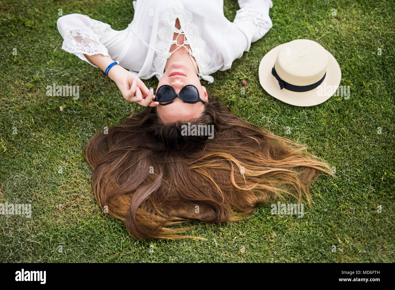 Beautiful Young Woman Lies On The Grass Fresh Natural Summer Concept