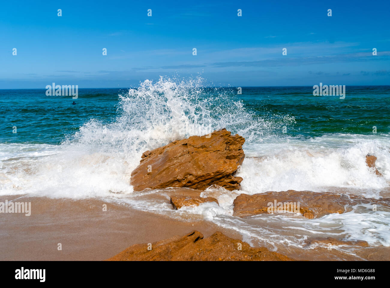 Against big waves hi-res stock photography and images - Alamy