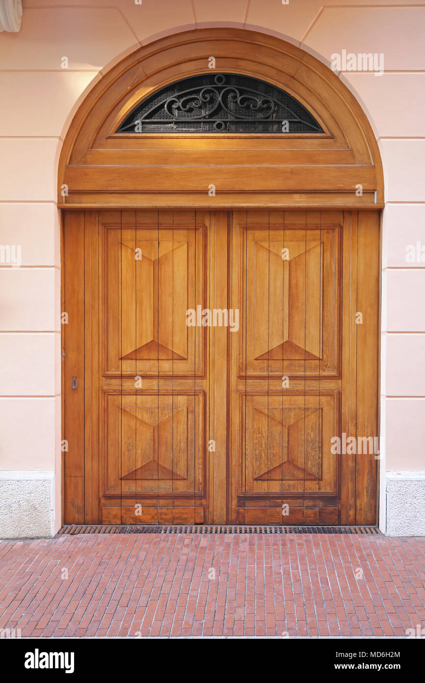 Double Wooden Door With Arch at House Stock Photo - Alamy
