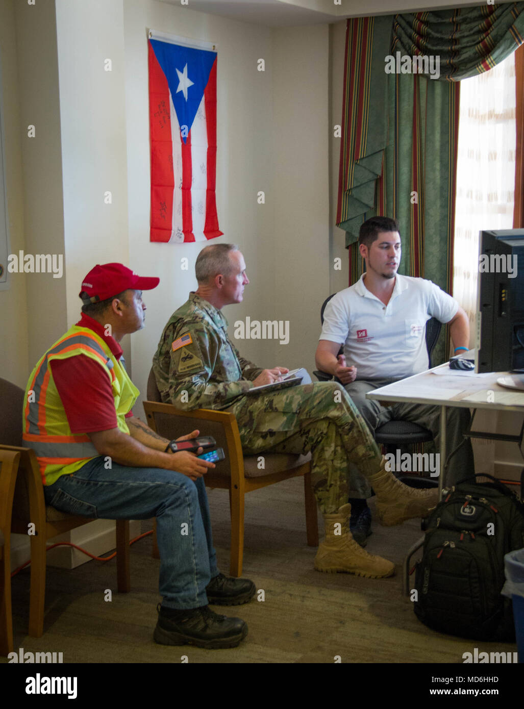COL Jason Kirk, Commander of Task Force Power Restoration, receives a ...