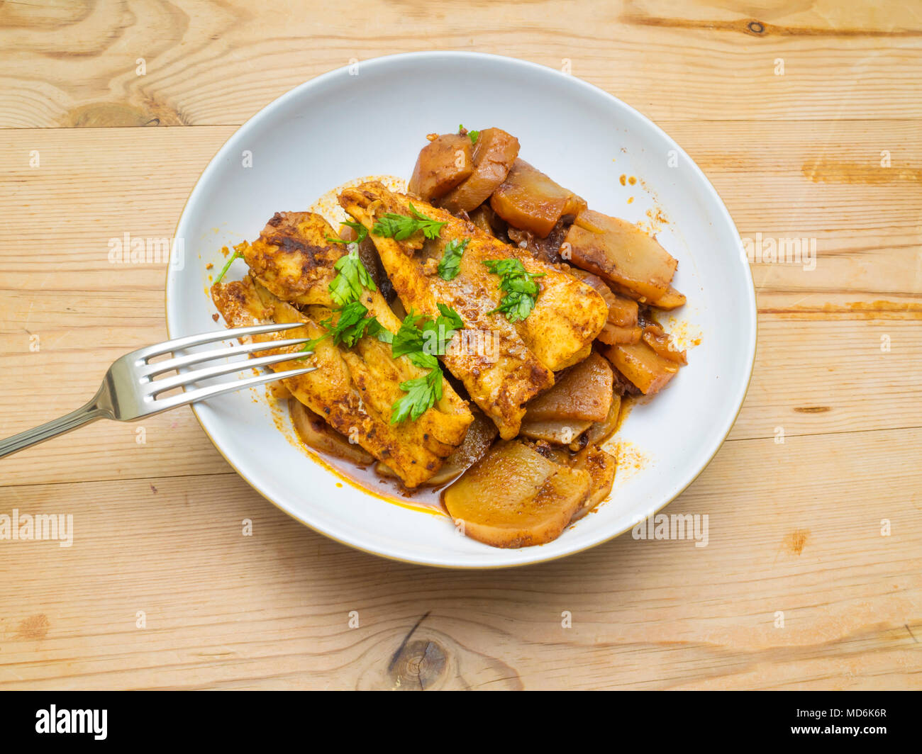 Moroccan Fish Casserole or Tagine Samak made white turnips and dates ...