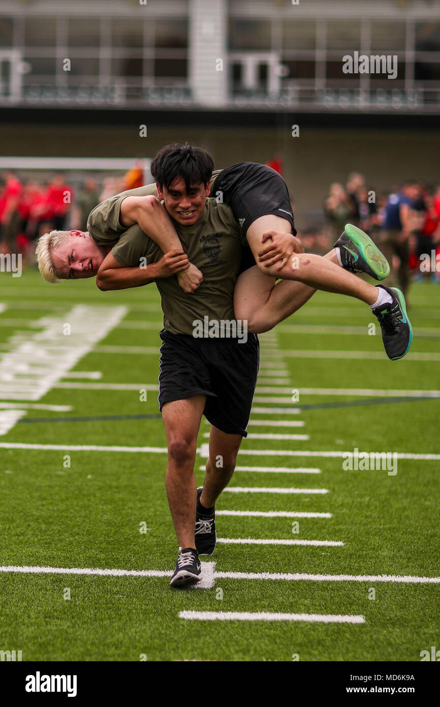 U.S. Marines and poolees with Recruiting Station Houston, conduct an ...