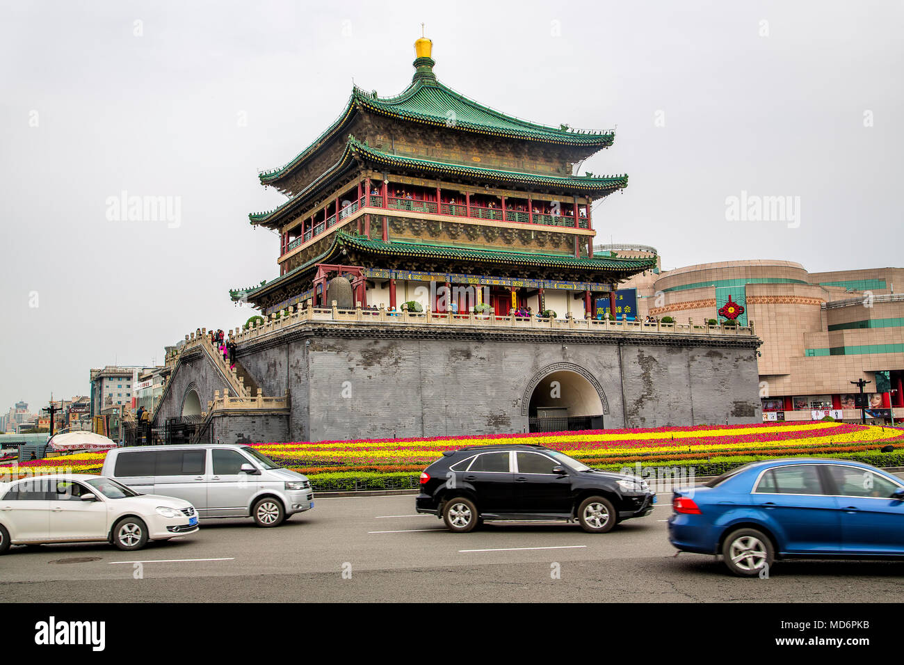 The Bell Tower at Xi'an, China. Visitors can be seen looking at and out ...