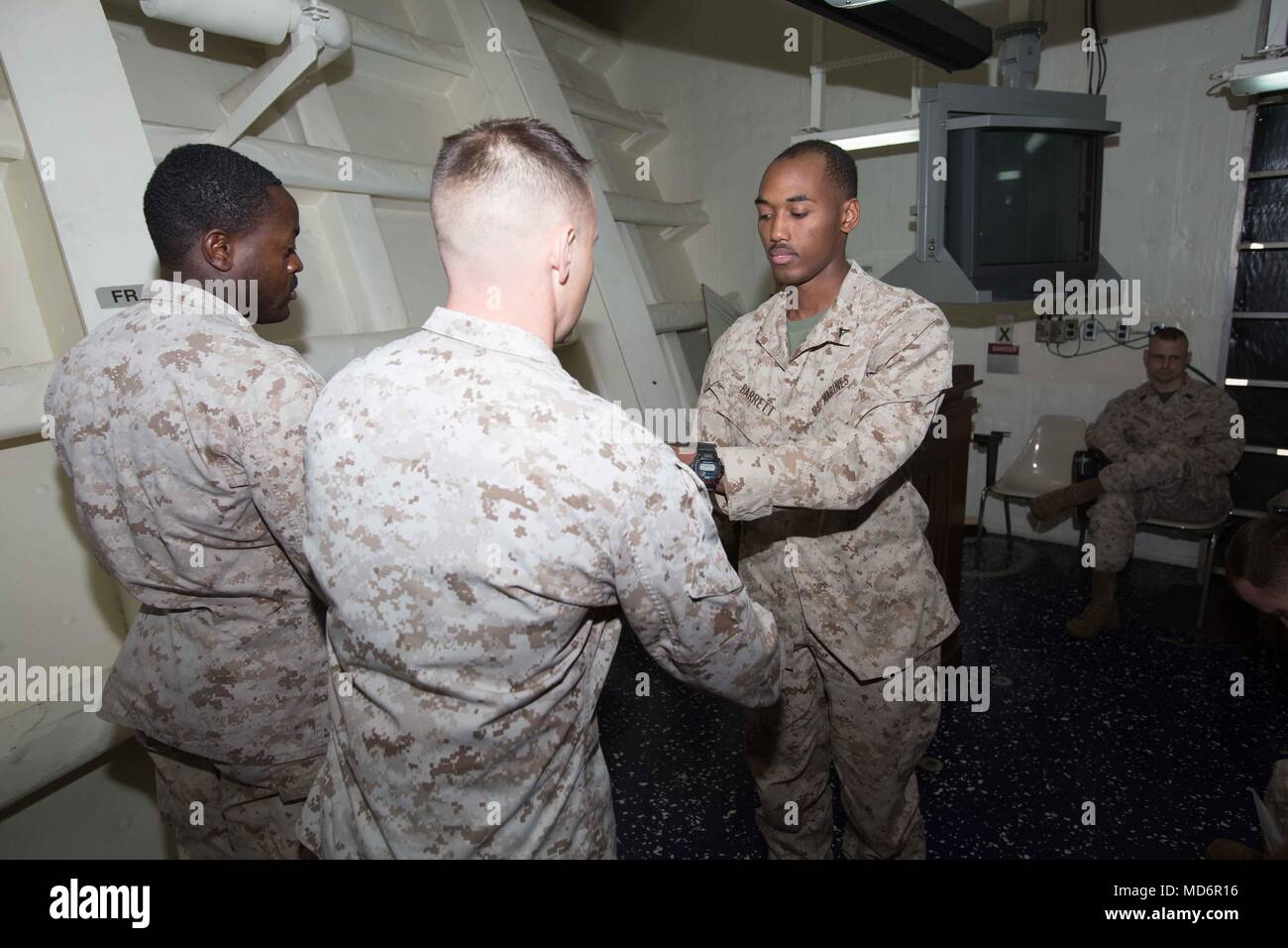 U.S. Marine Corps Lance Cpl. Malique E. Barrett, a combat engineer with ...