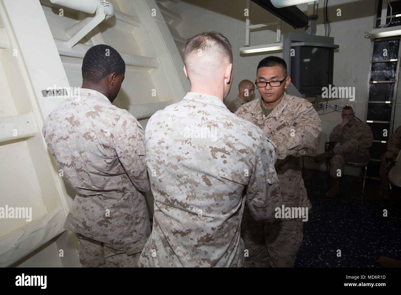 U.S. Marine Corps Lance Cpl. Karl M. Fernandez, an engineer equipment ...