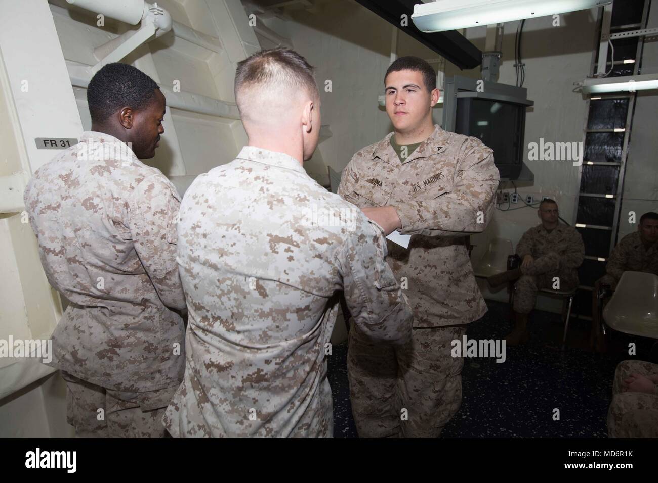 U.S. Marine Corps Lance Cpl. Nicholas A. Lima, a field radio operator ...