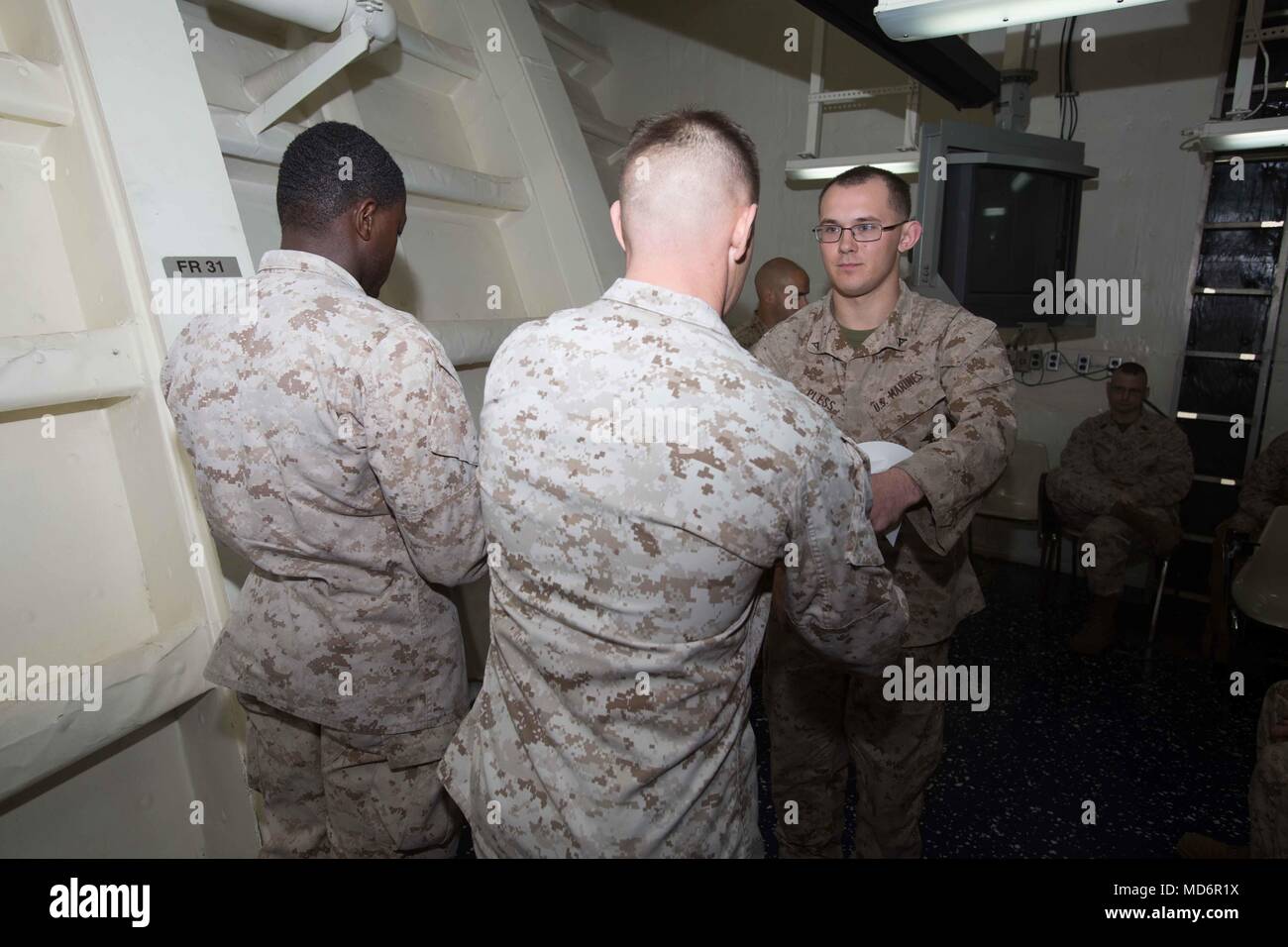 U.S. Marine Corps Lance Cpl. Alexander N. Pless, a supply ...