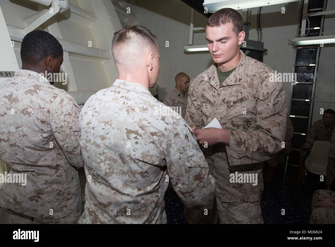 U.S. Marine Corps Lance Cpl. Cody E. Rautheaux, a rifleman with ...