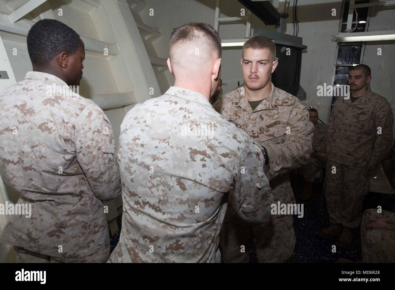 U.S. Marine Corps Lance Cpl. Jack F. Sweeney, a machine gunner with ...