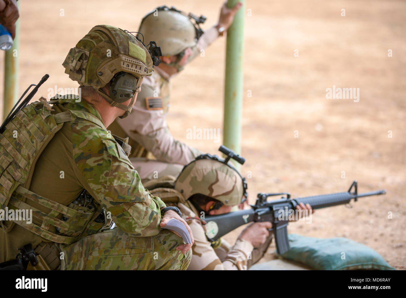 Australian army Cpl. Luke Ryder, with Task Force Taji, observes Iraqi ...