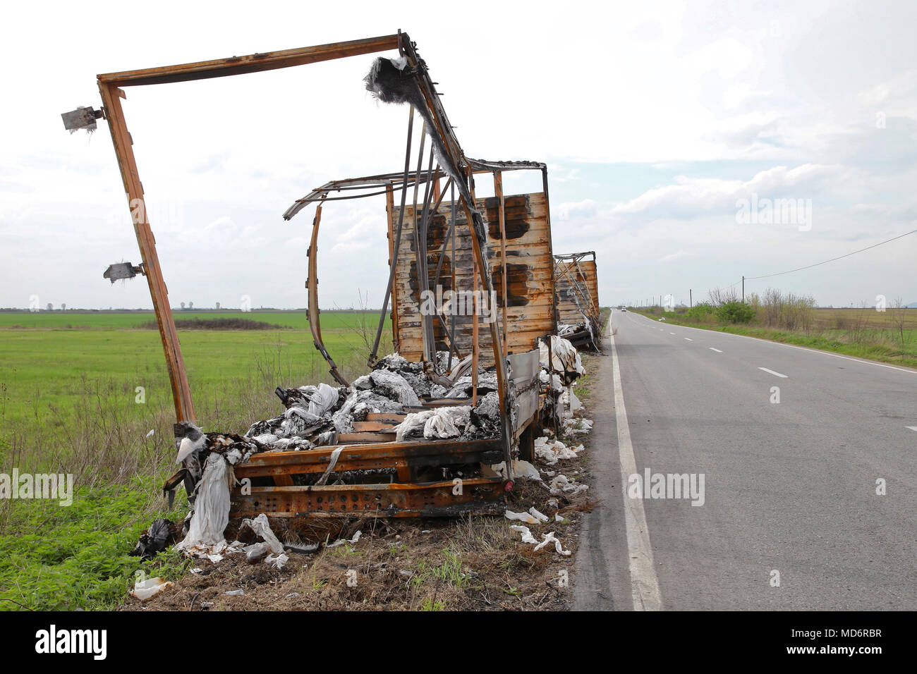 Truck and Trailer Destroyed in Fire on Side of the Road Stock Photo - Alamy