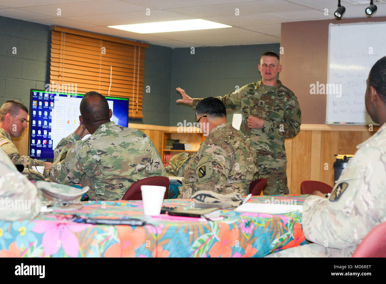 U.S. Army Sgt. First Class Michael Hyer, and observer-coach/trainer ...