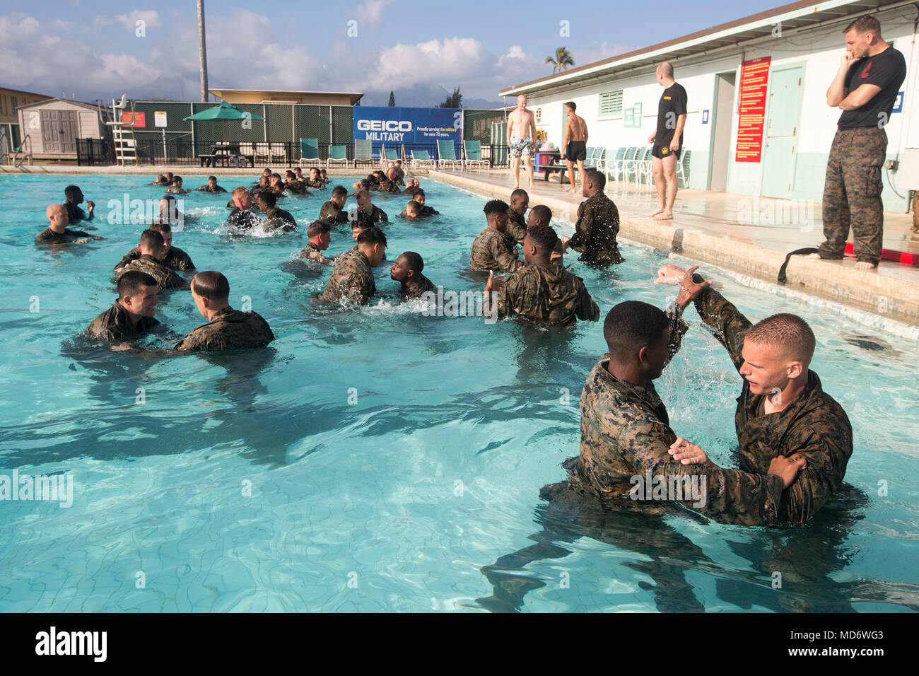 U.S. Marines with 3rd Marine Regiment conduct shallow water grappling ...
