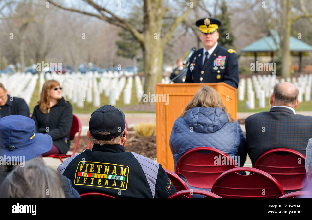 Vietnam War veterans and local residents listen to Maj. Gen. Duane ...